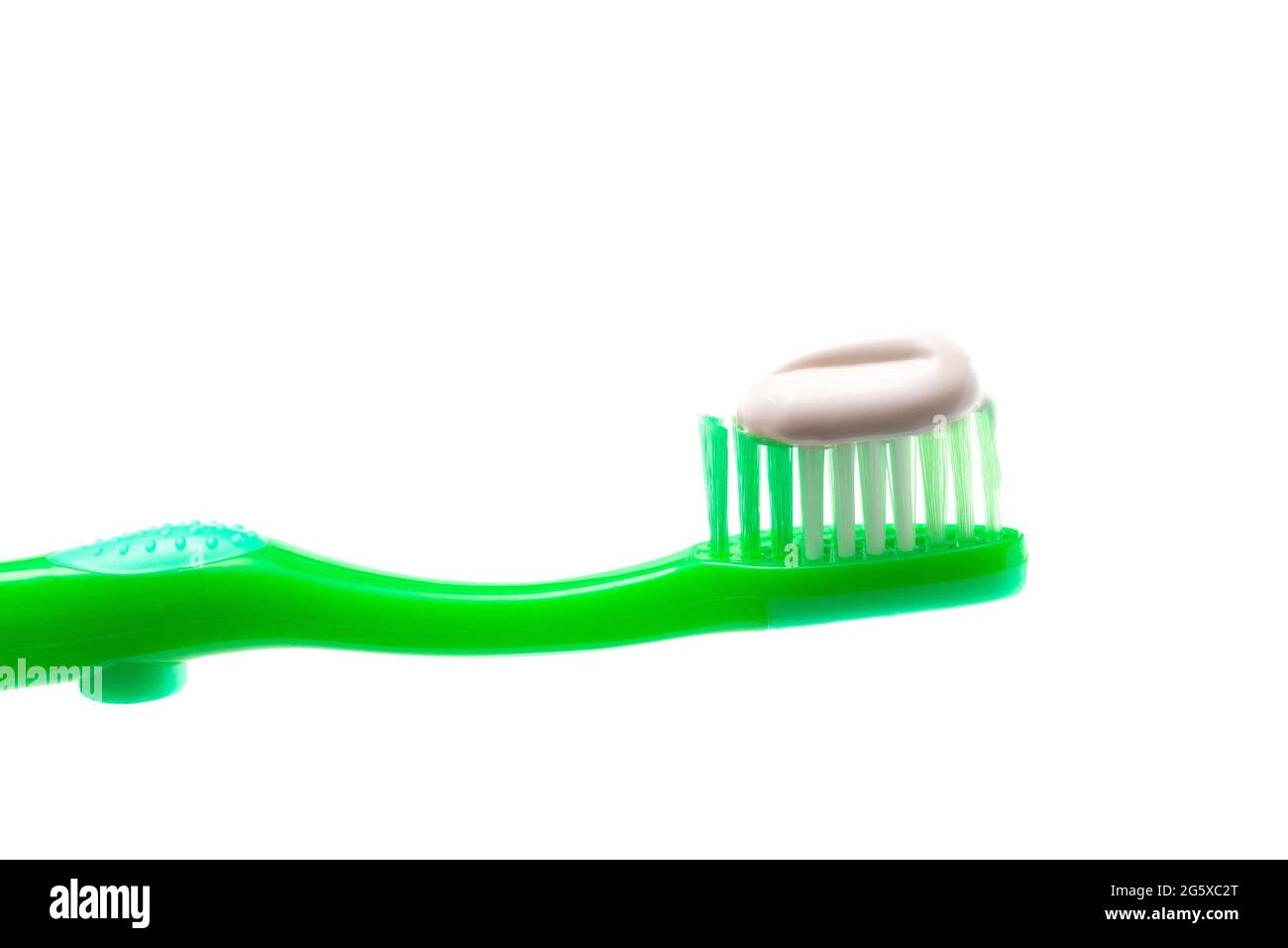 A Simple Toothbrush on a White Background with Toothpaste Applied to ...
