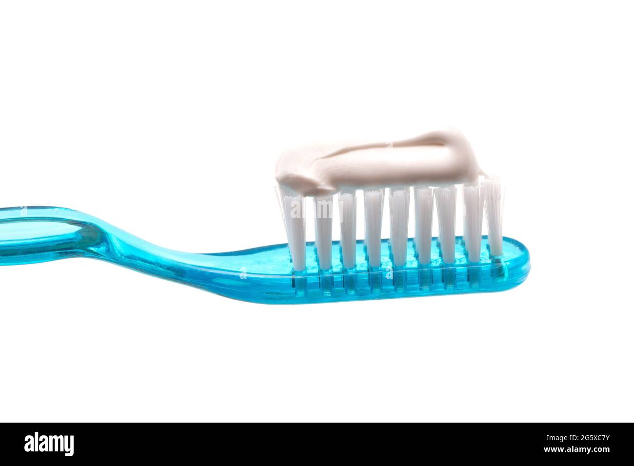 A Simple Toothbrush on a White Background with Toothpaste Applied to ...