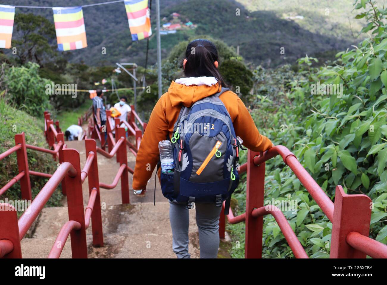 hiking girl who going back down the stairs Stock Photo - Alamy