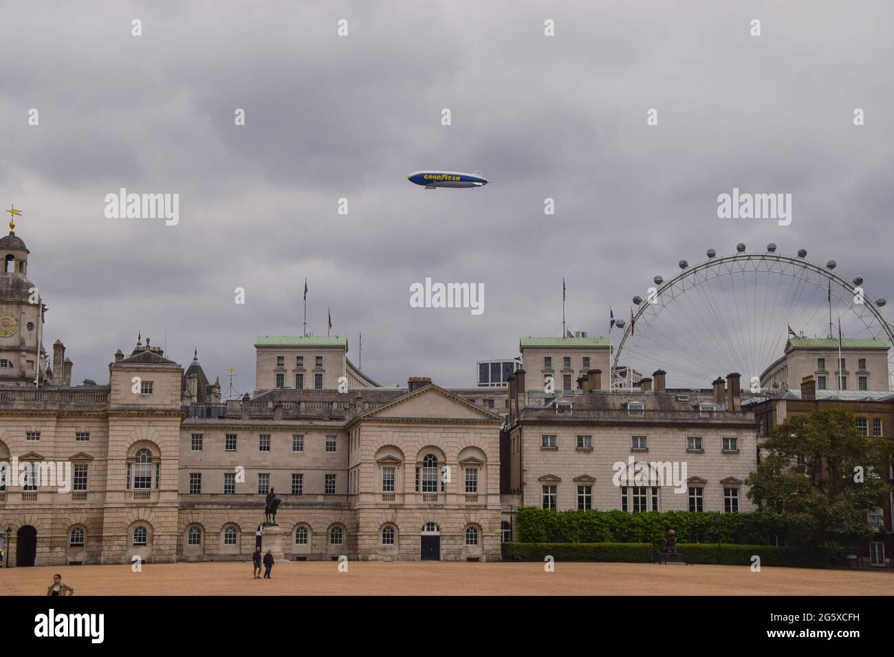 London, UK. 30th June, 2021. A Goodyear blimp flying over Horse Guards ...