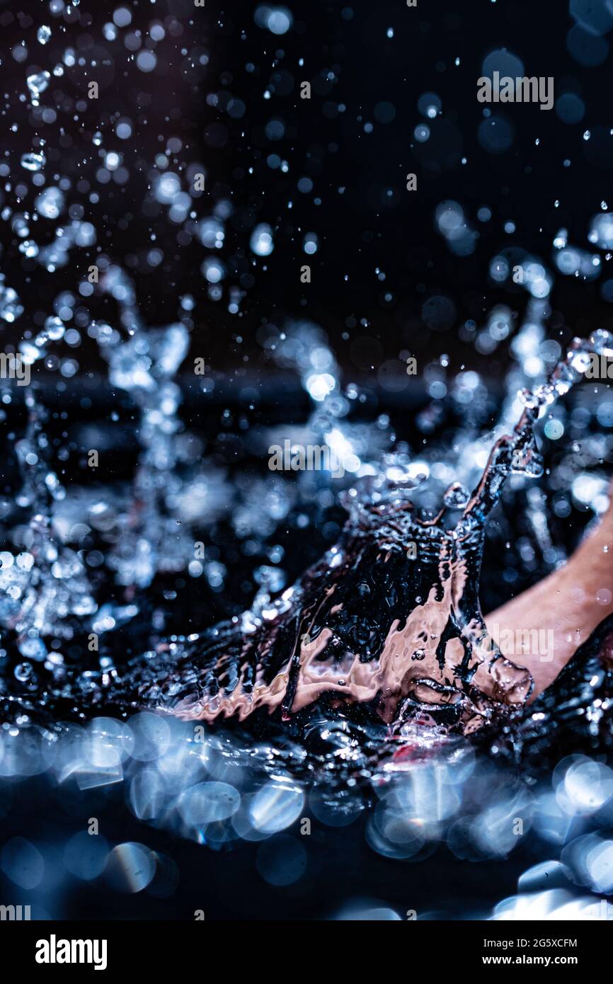 hand splashing in water close-up Stock Photo - Alamy