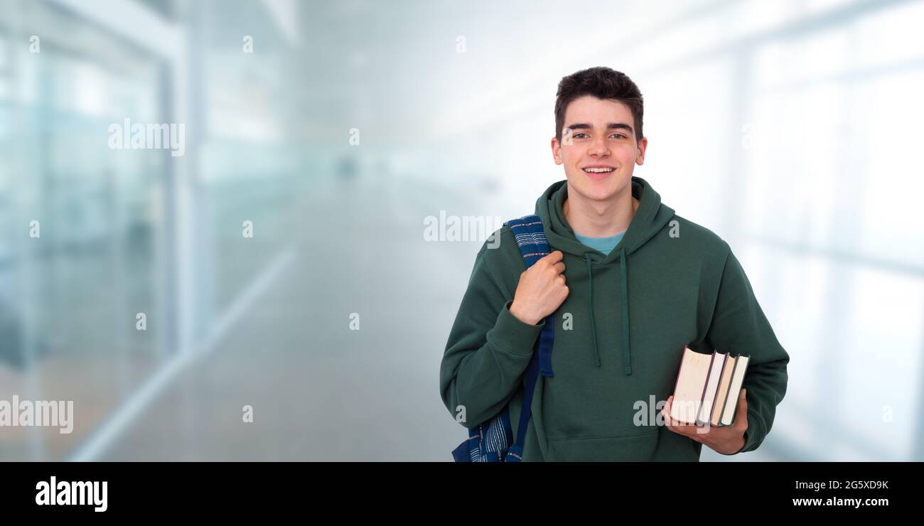 student with books at school Stock Photo - Alamy