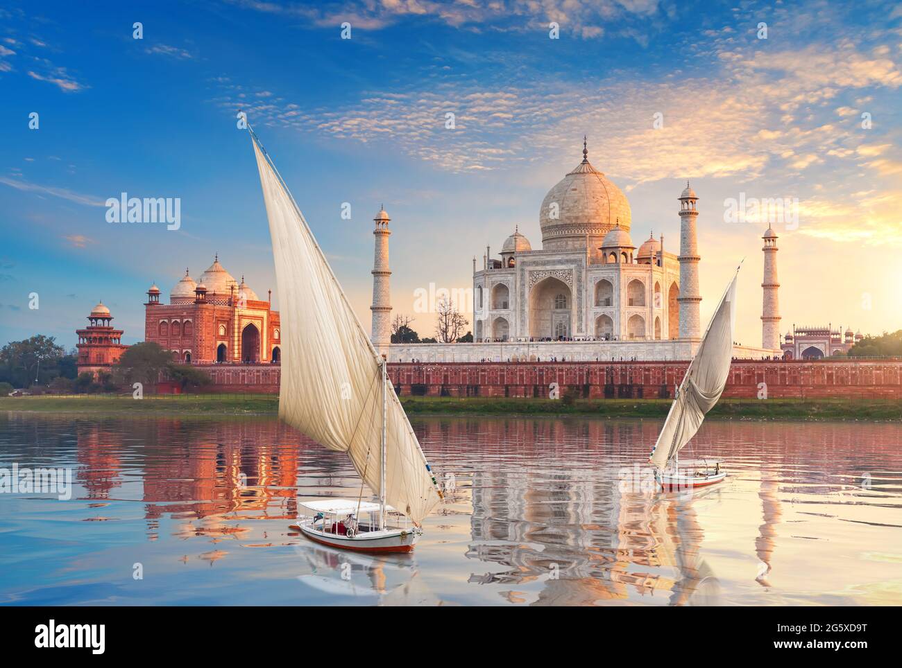 Famous Taj Mahal complex, the Yamuna river and boats, beautiful sunset ...