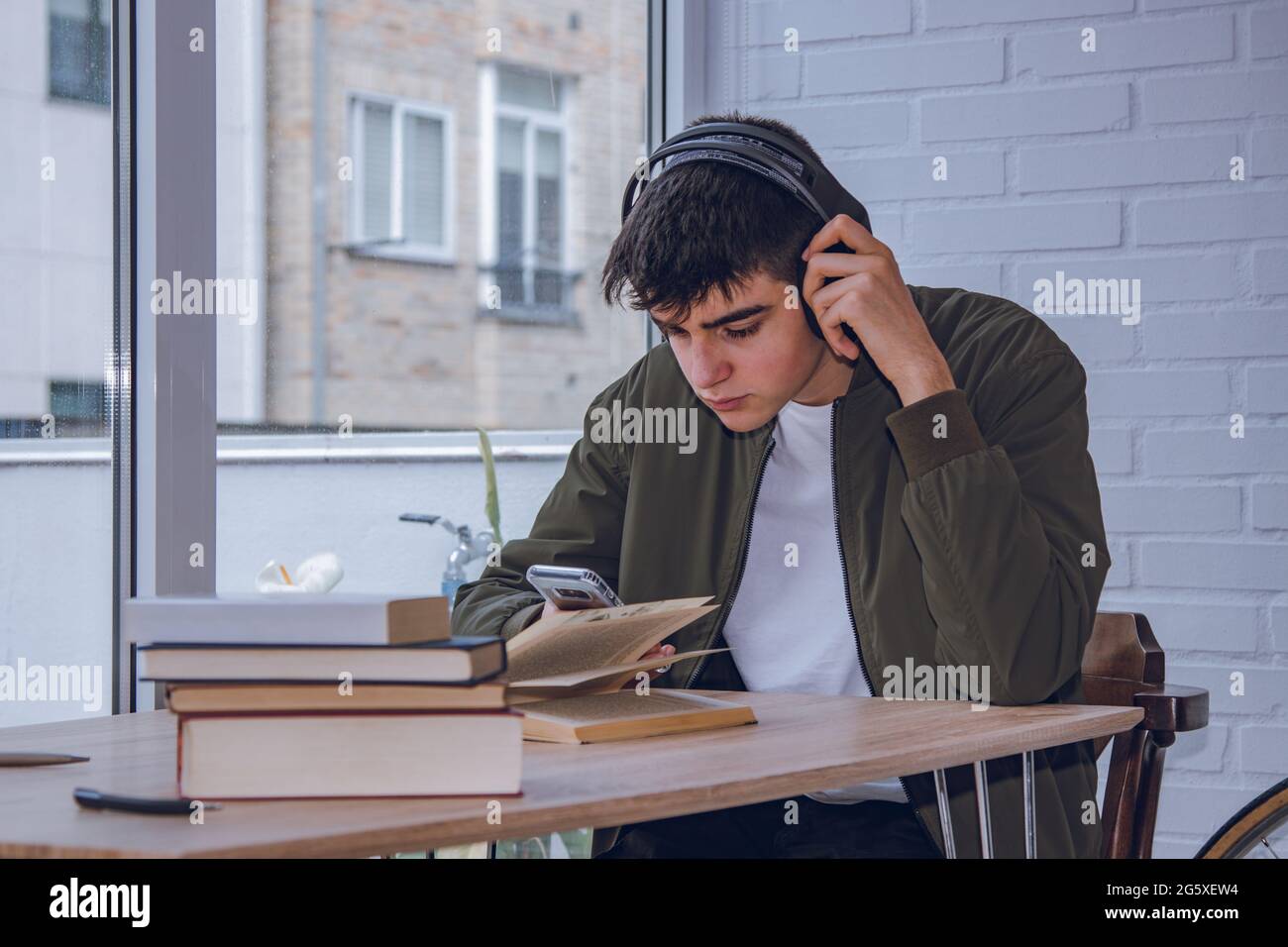 Mobile phone school classroom desk hi-res stock photography and images ...