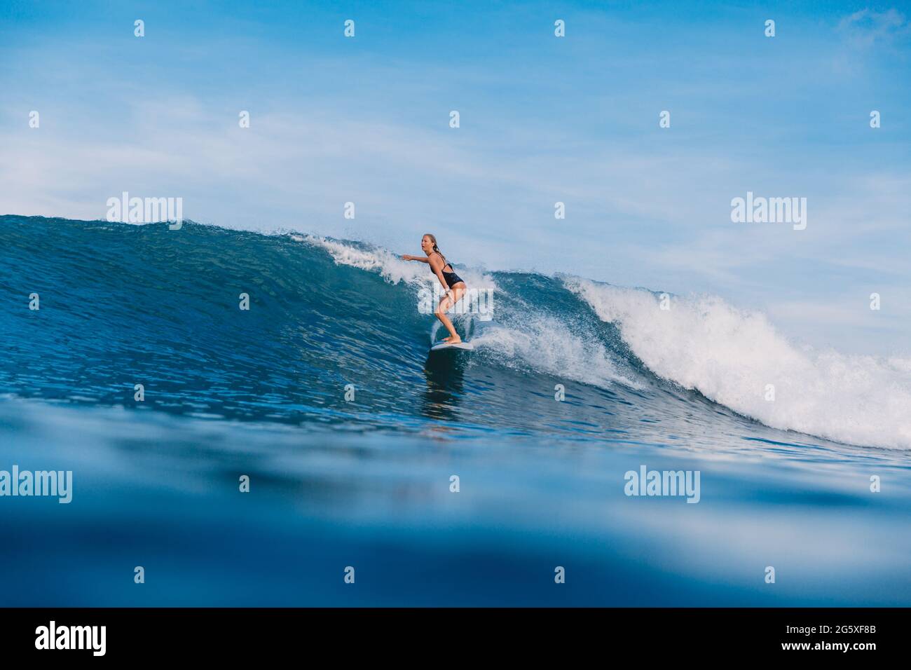 Professional female surfer wave hi-res stock photography and images - Alamy