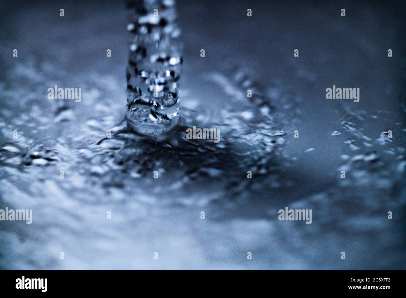 Water bubbles close-up. Tap water from a faucet. Extreme macro close-up ...