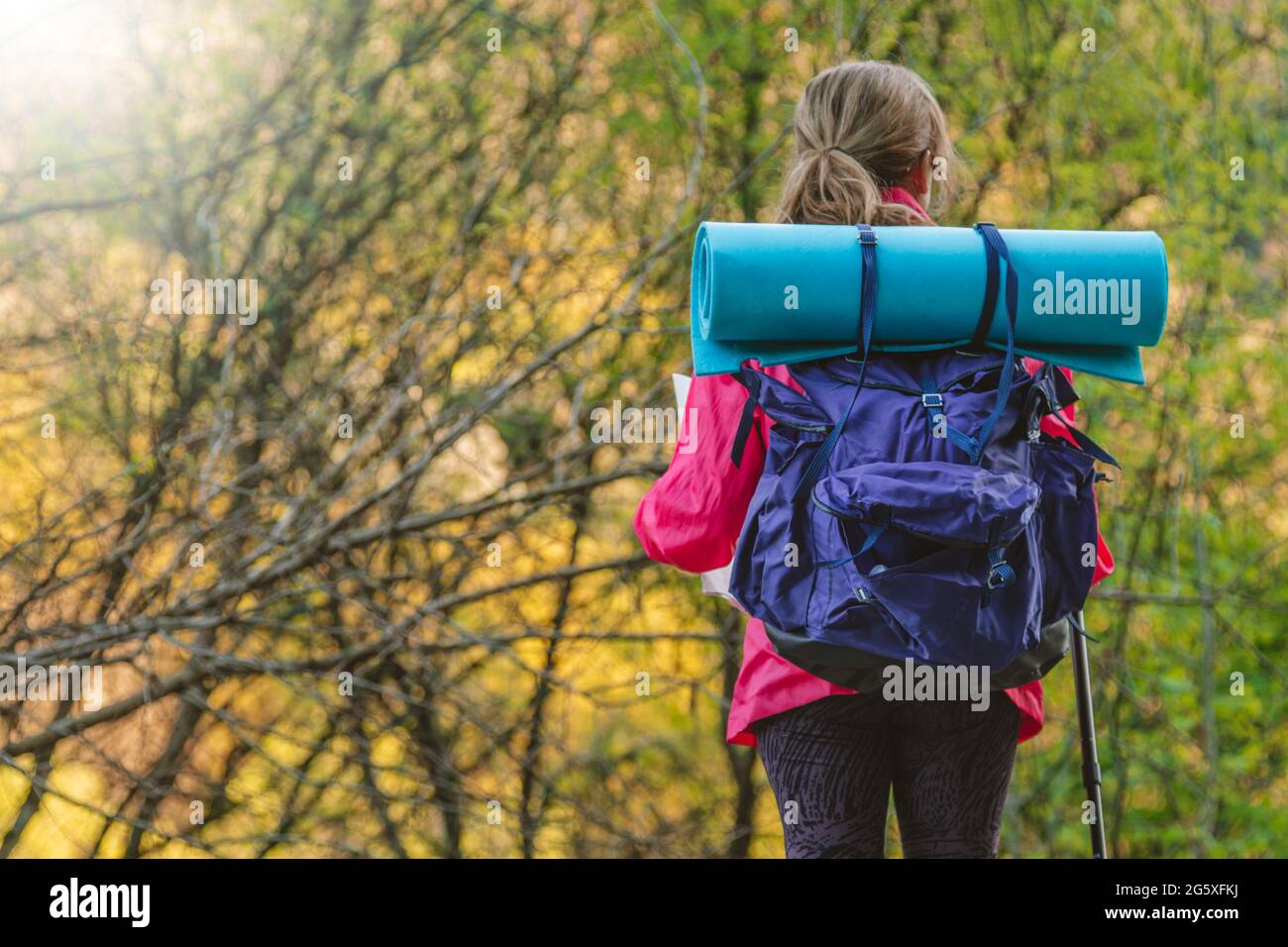 woman with backpack on her back in the mountains Stock Photo - Alamy