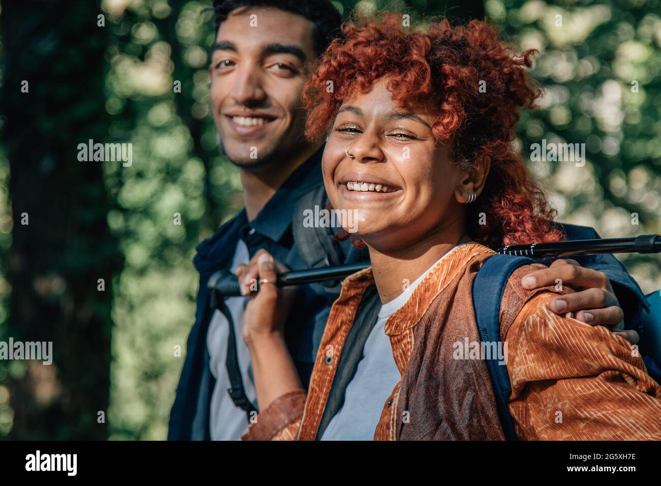 multicultural couple traveling in nature Stock Photo - Alamy