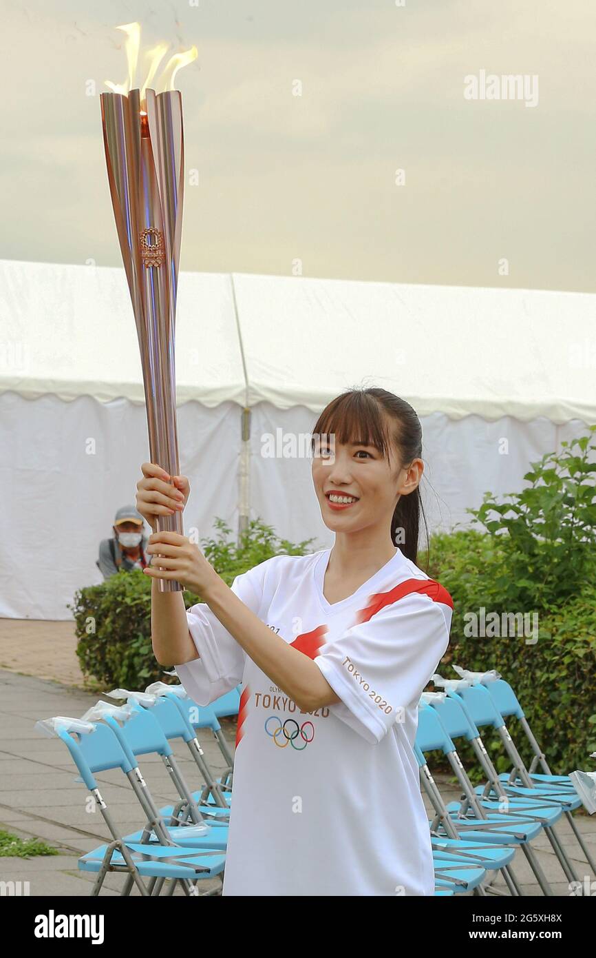 Kanagawa, Japan. 30th June, 2021. Torchbearer, Japanese singer Reni ...