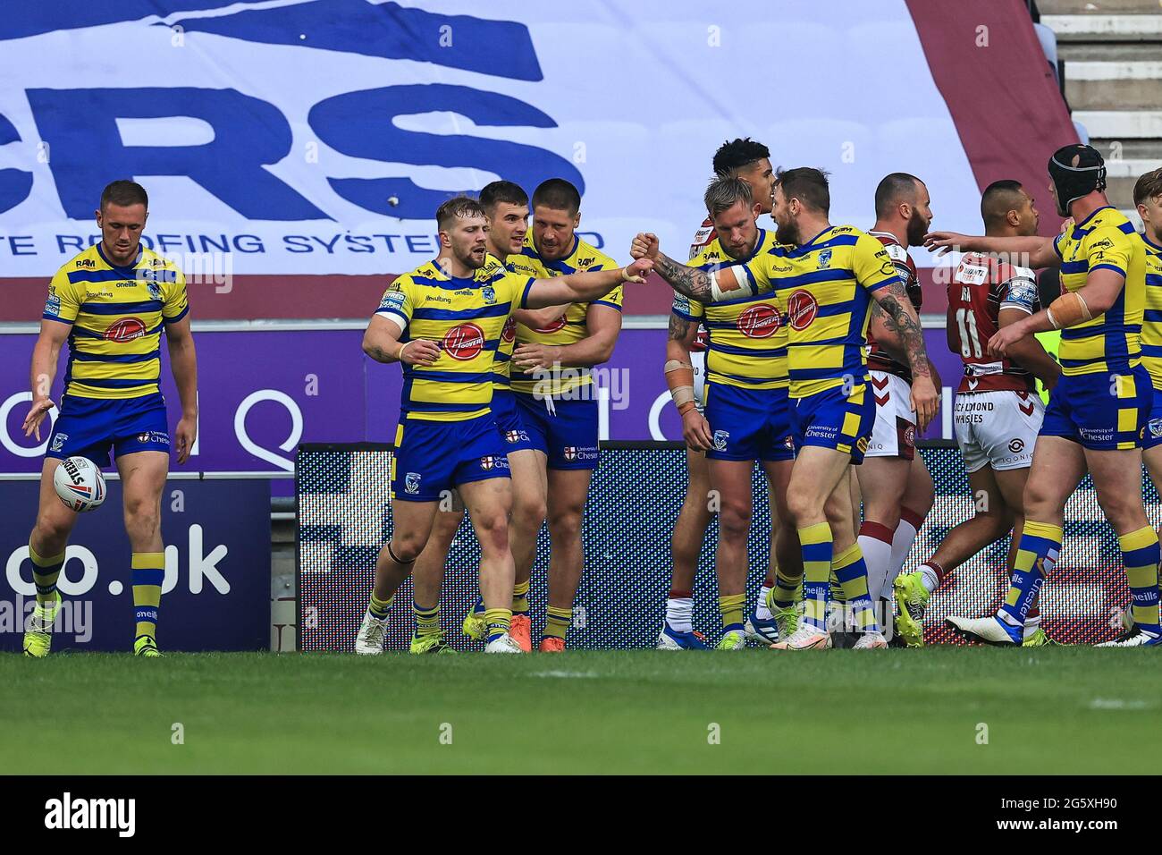 Connor Wrench (27) of Warrington Wolves celebrates his try Stock Photo ...