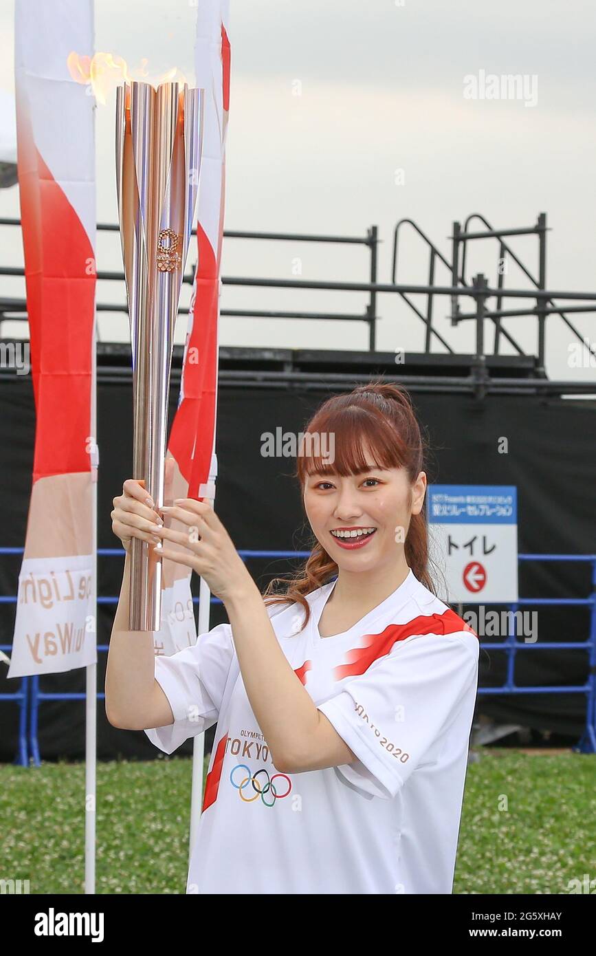 Kanagawa, Japan. 30th June, 2021. Torchbearer, Japanese singer Ayaka ...