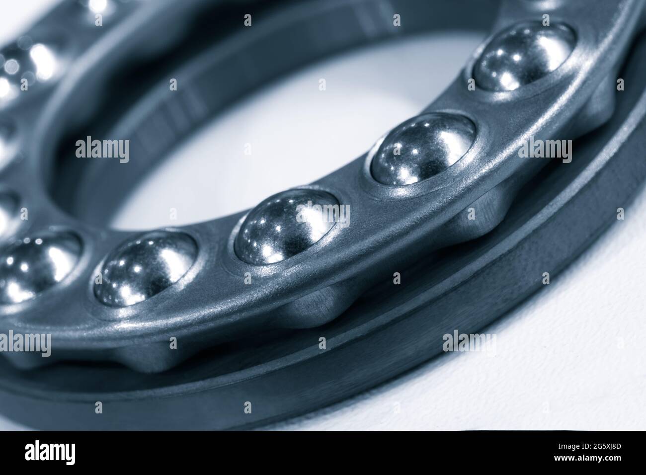 Steel bearing closeup isolated on white background Stock Photo - Alamy
