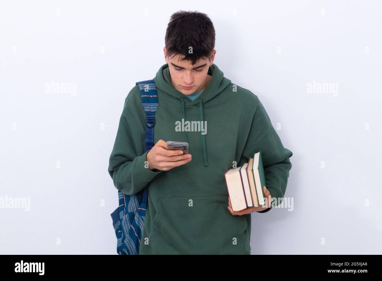 teenage student with cell phone isolated Stock Photo - Alamy