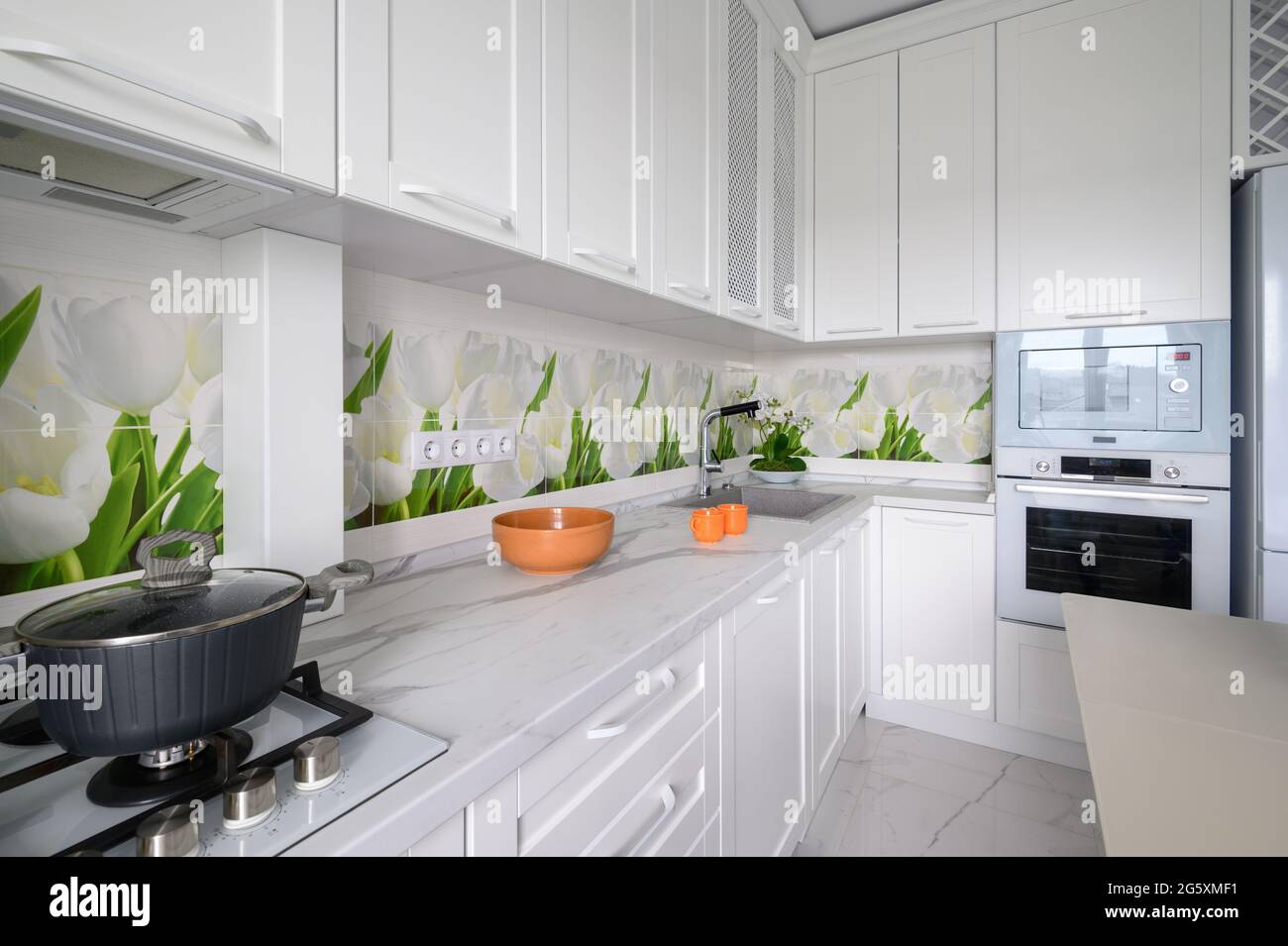 Modern luxurious kitchen closeup view to gas stove Stock Photo - Alamy