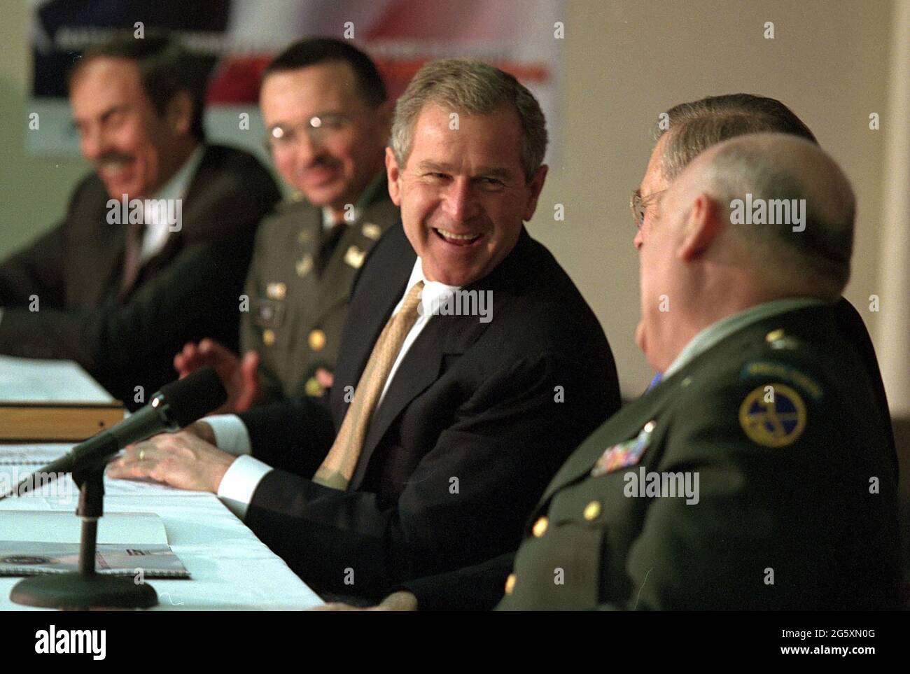 United States President George W. Bush shares a laugh with, from left ...