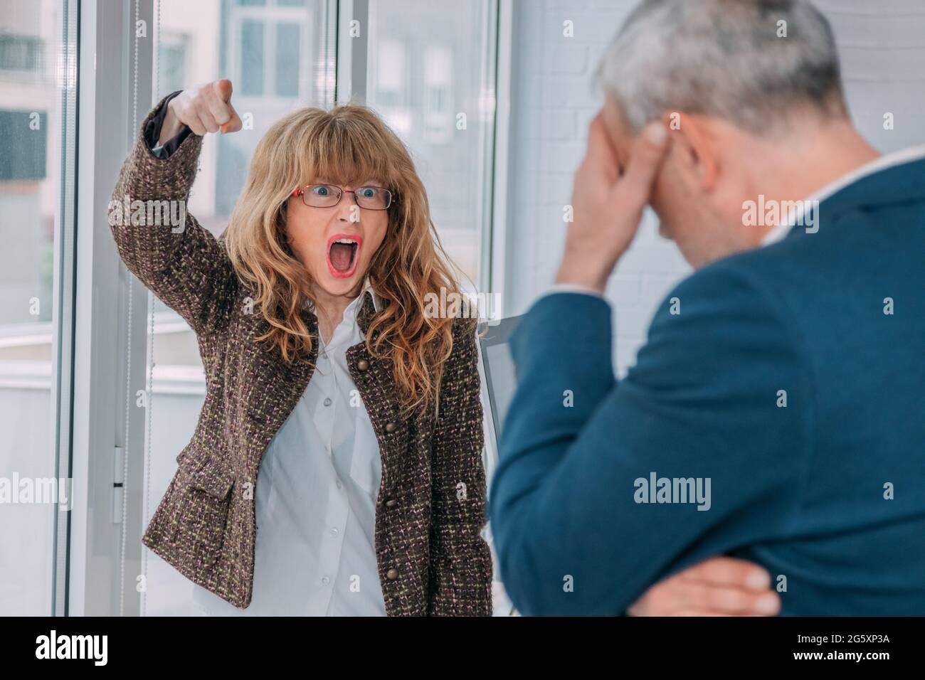 Woman firing hi-res stock photography and images - Alamy