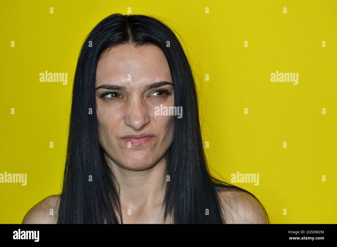 Closeup portrait skeptical young woman looking suspicious, some disgust ...