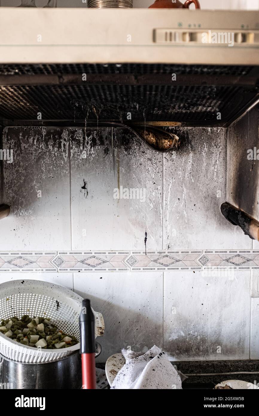 Dirty and burn domestic kitchen with black ashes Stock Photo - Alamy