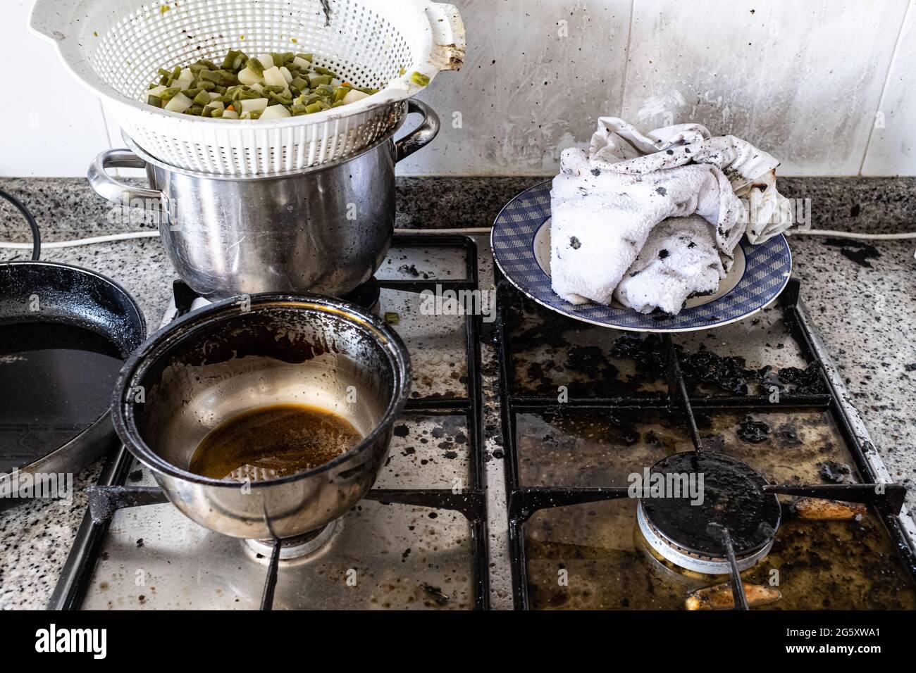 Dirty and burn domestic kitchen with black ashes Stock Photo - Alamy