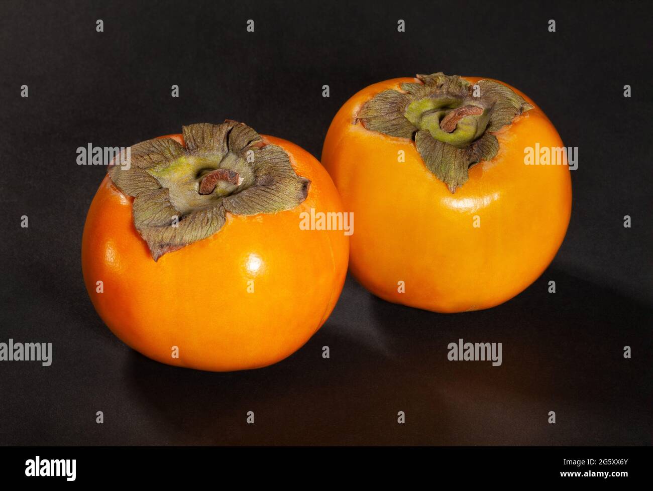Black persimmon hi-res stock photography and images - Alamy