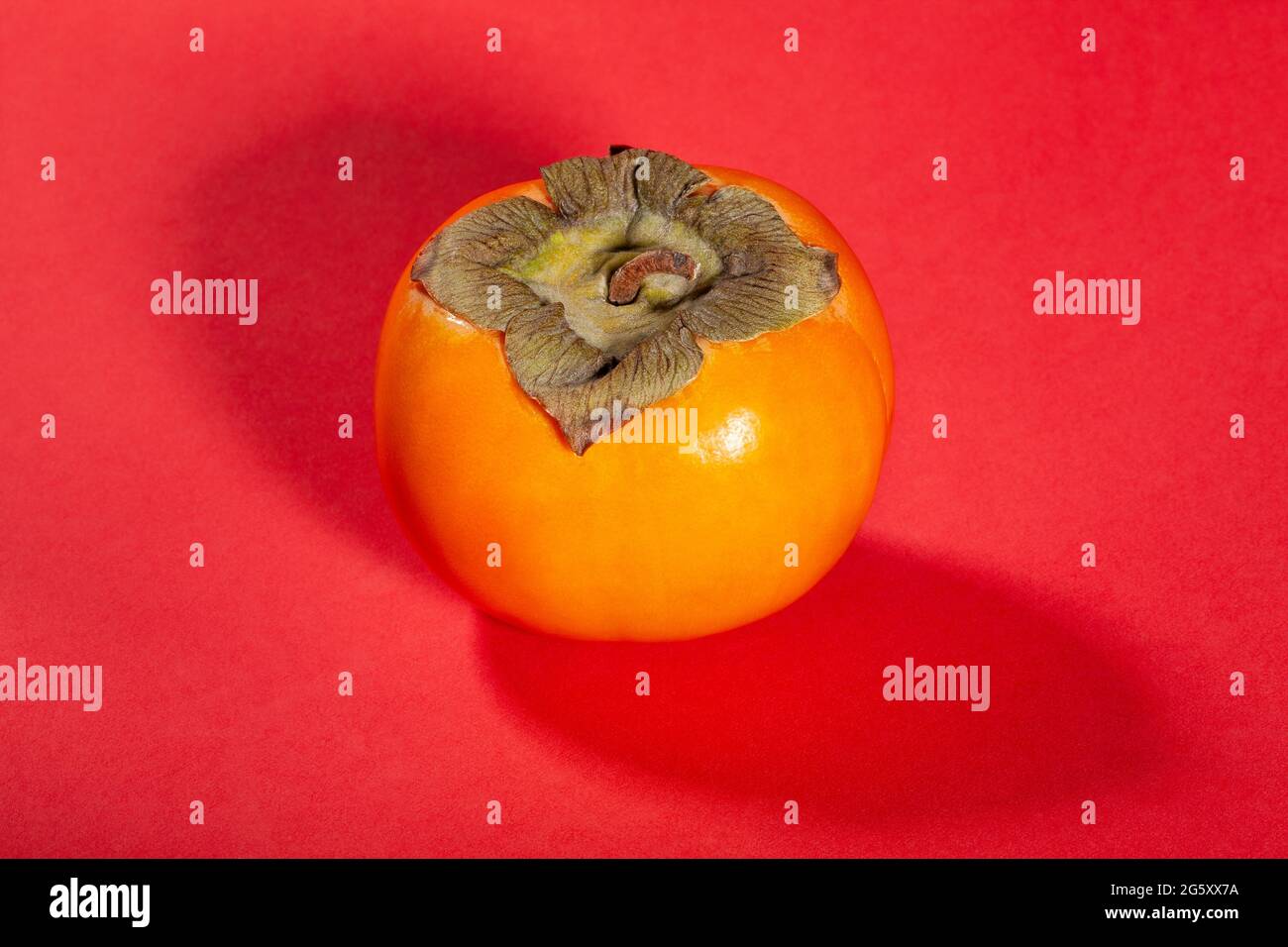 Red persimmon hi-res stock photography and images - Alamy