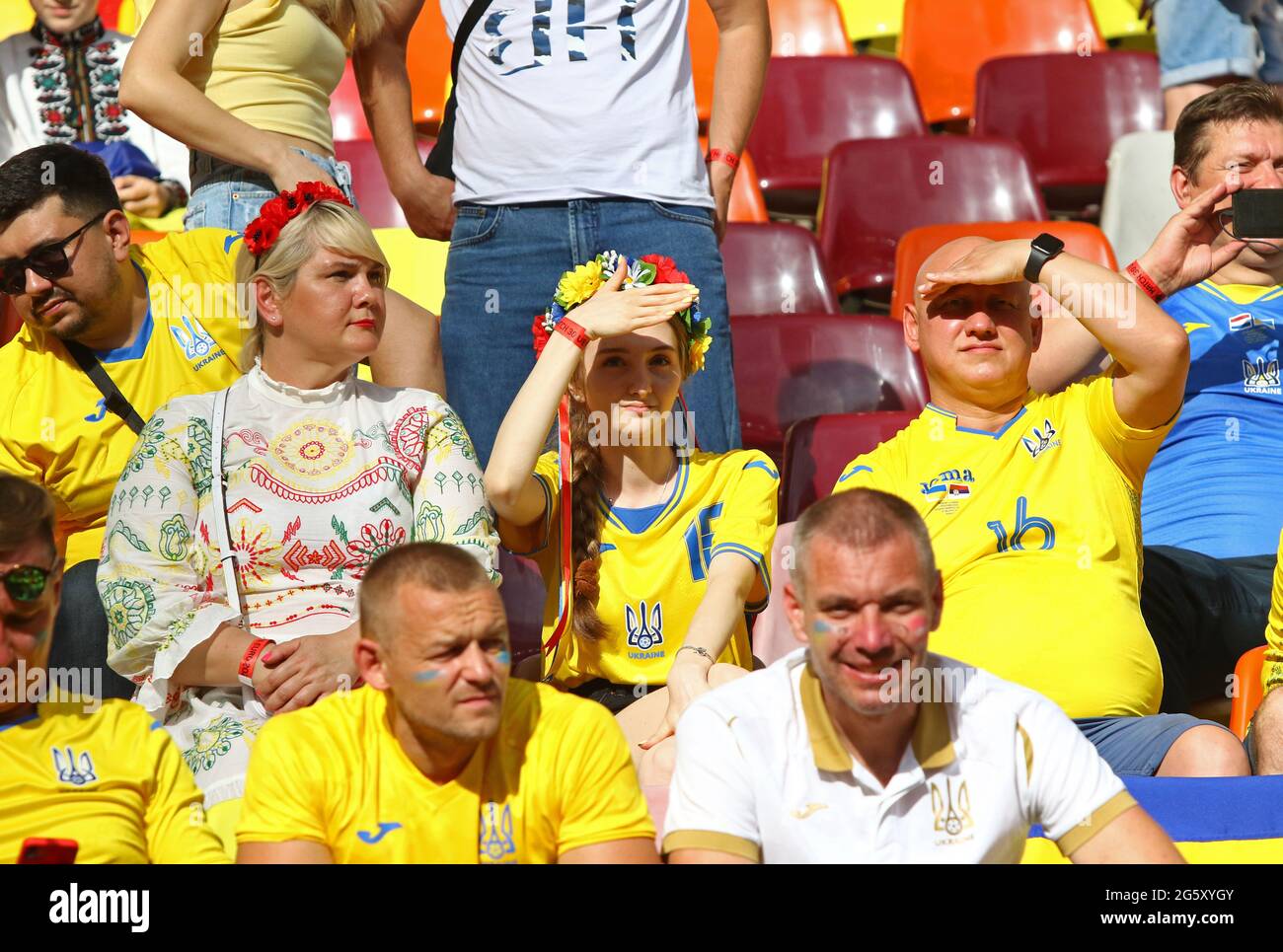 BUCHAREST, ROMANIA - JUNE 21, 2021: Ukrainian football fans watch the ...