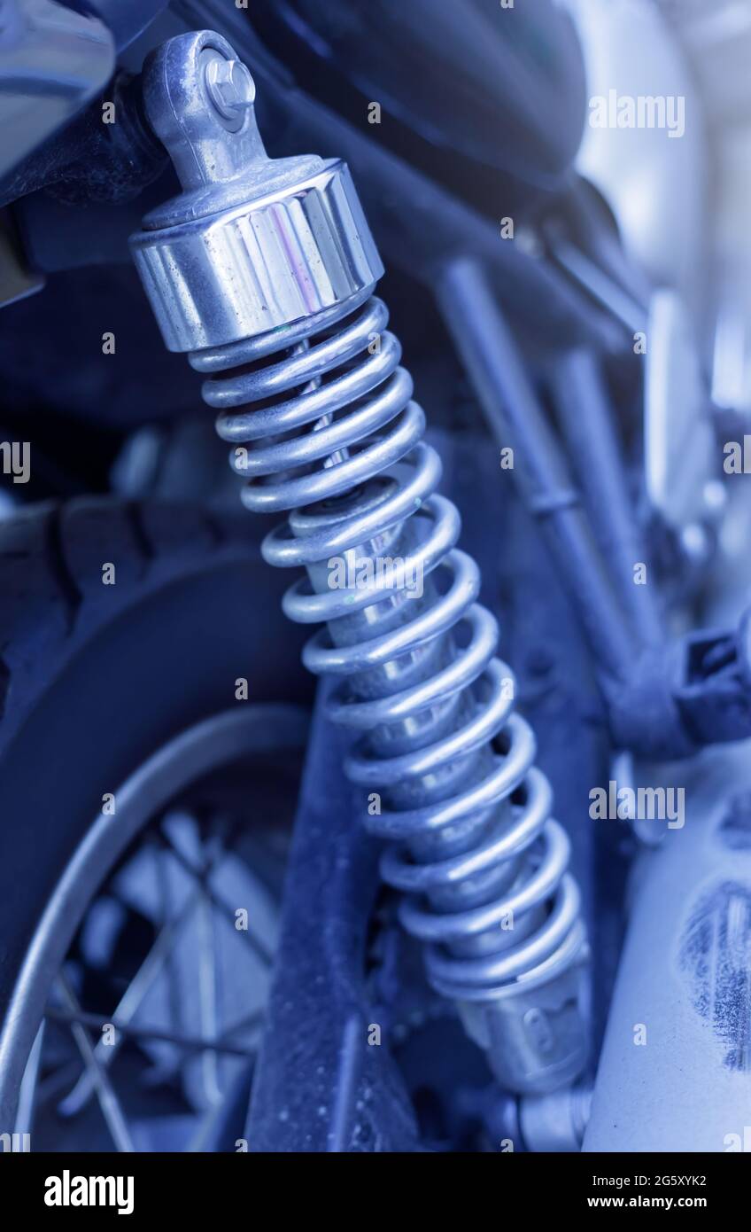 Retro motorcycle rear wheel shock absorber and wheel Stock Photo - Alamy