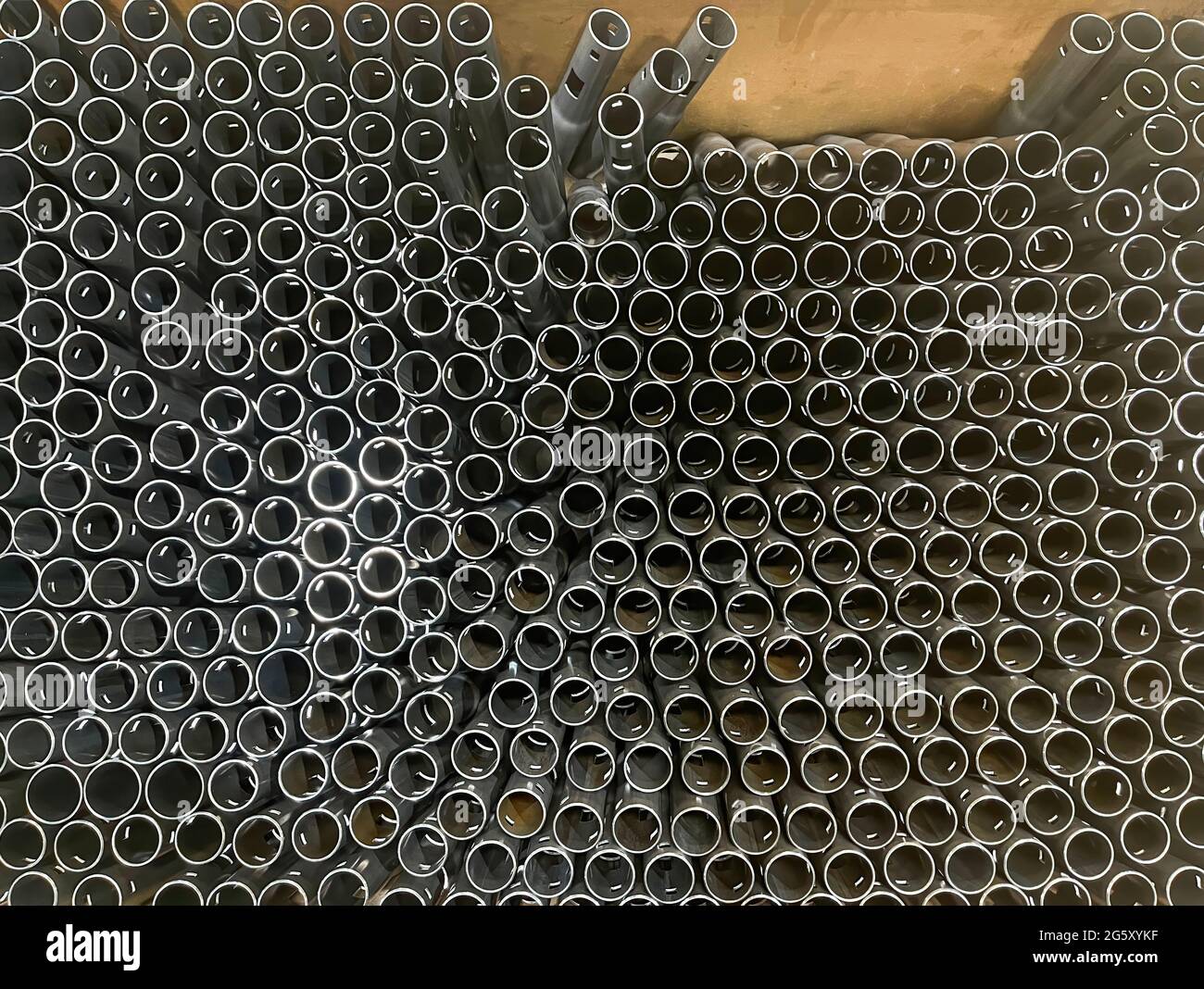top view of a box full of pipes, car spare parts, metal industry ...