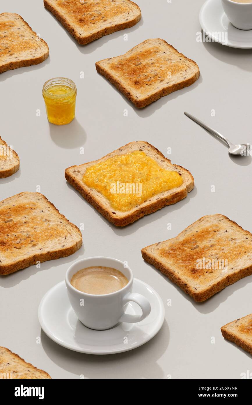 Pattern with toast and lemon jam on gray background Stock Photo - Alamy