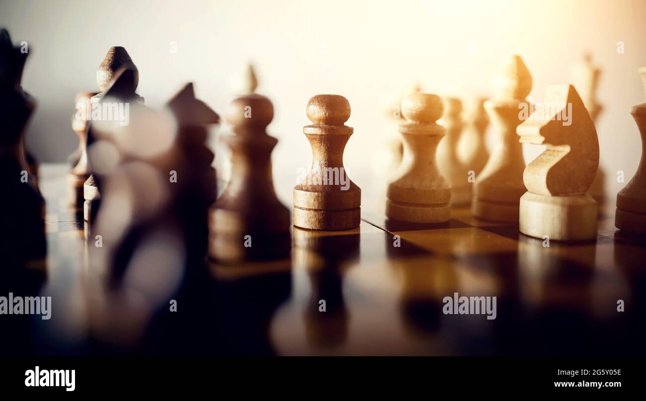 Wooden chess pieces on the chessboard. Intellectual game -chess. Chess ...