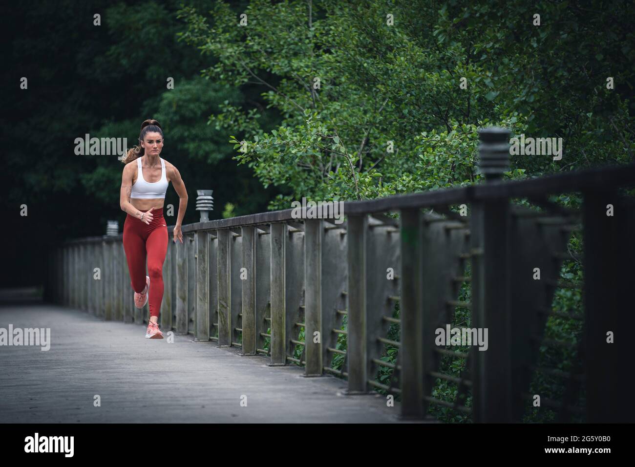 Athlete girl running, it is her lifestyle Stock Photo - Alamy