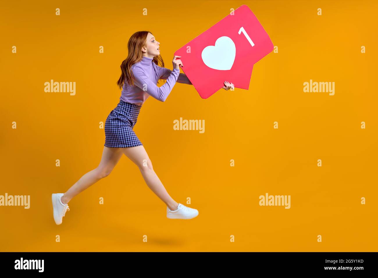 female chasing likes and appreciation, woman keeping social media heart ...