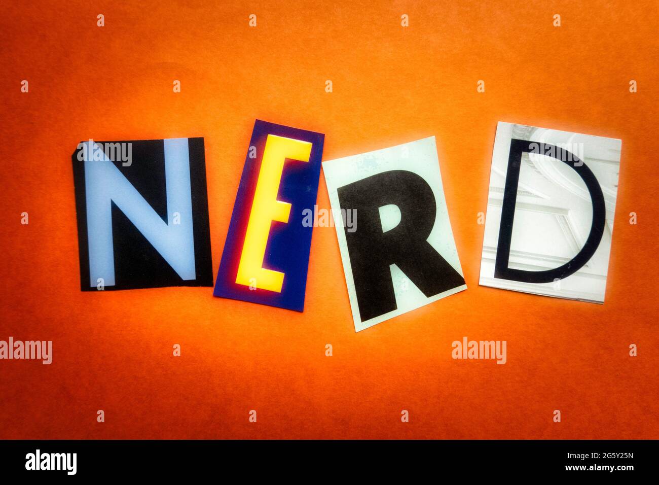 The word "Nerd" using cut-out paper letters in the ransom note effect ...