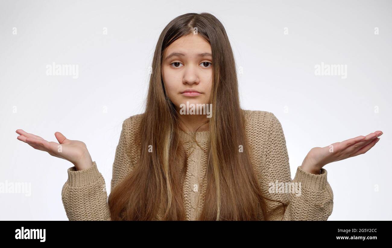 Confused or puzzled girl lost something and searching for it over white ...