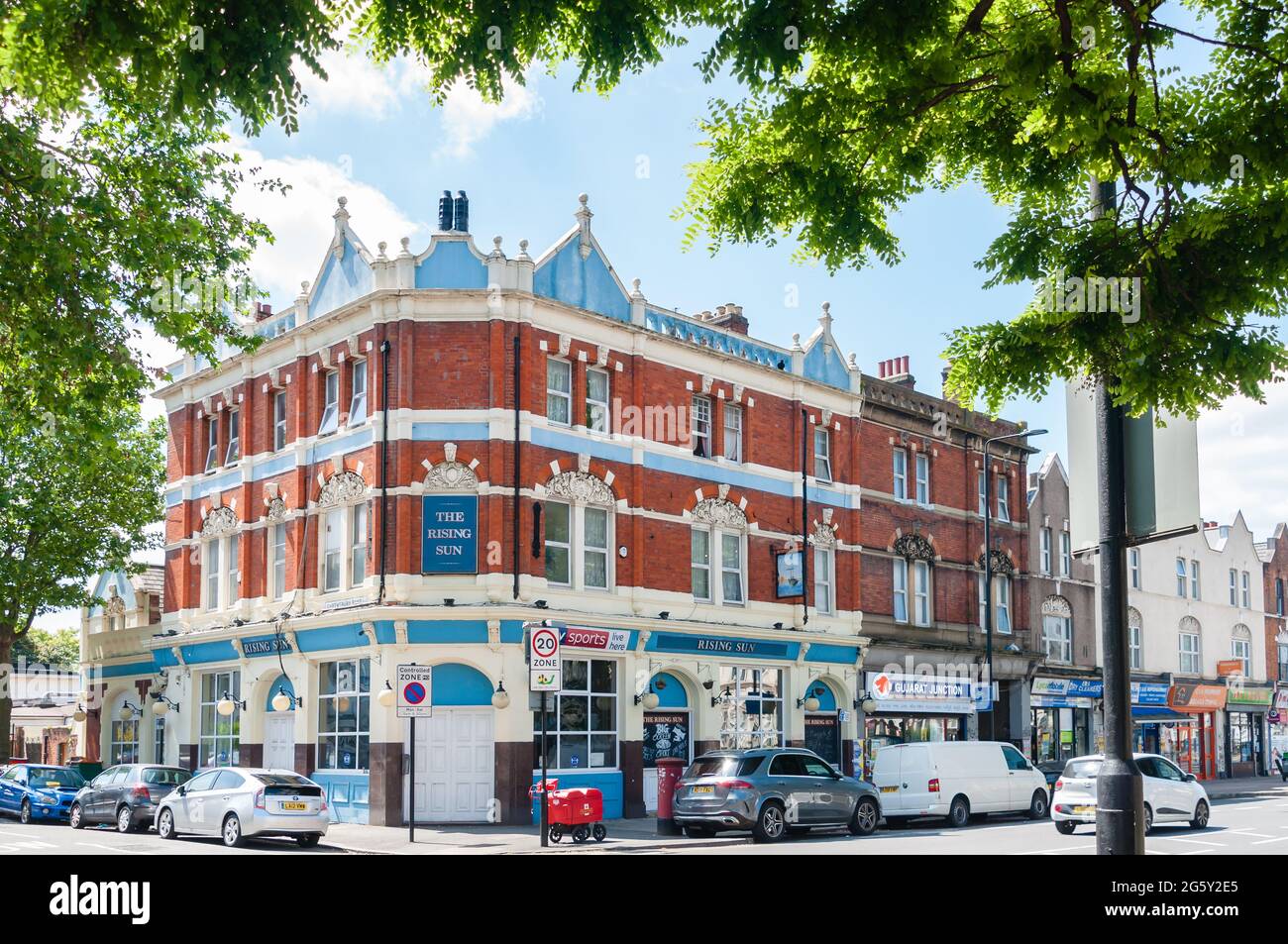 The Rising Sun Pub substantial three-storey building, with fancy white ...