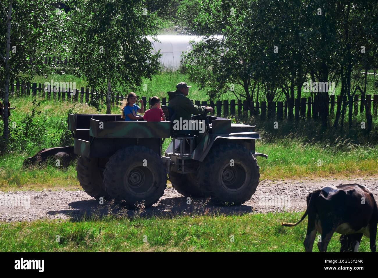 Cape, Russia - June 20, 2021: villagers rides a makeshift swamp buggy ...