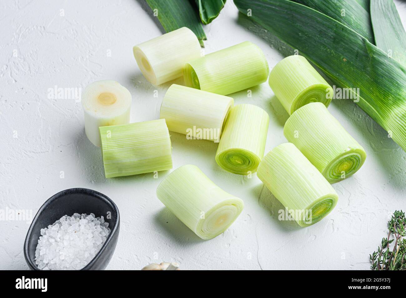 Raw chopped Leeks for grill uncooked with herbs ingredients , on ...