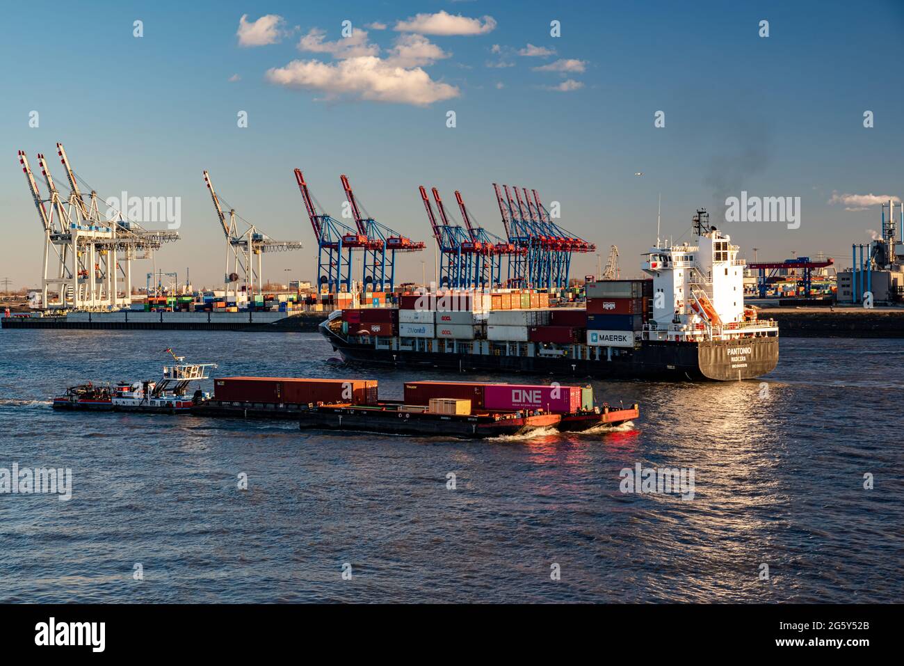 Two Cargo Ships cross in the port of Hamburg Stock Photo - Alamy