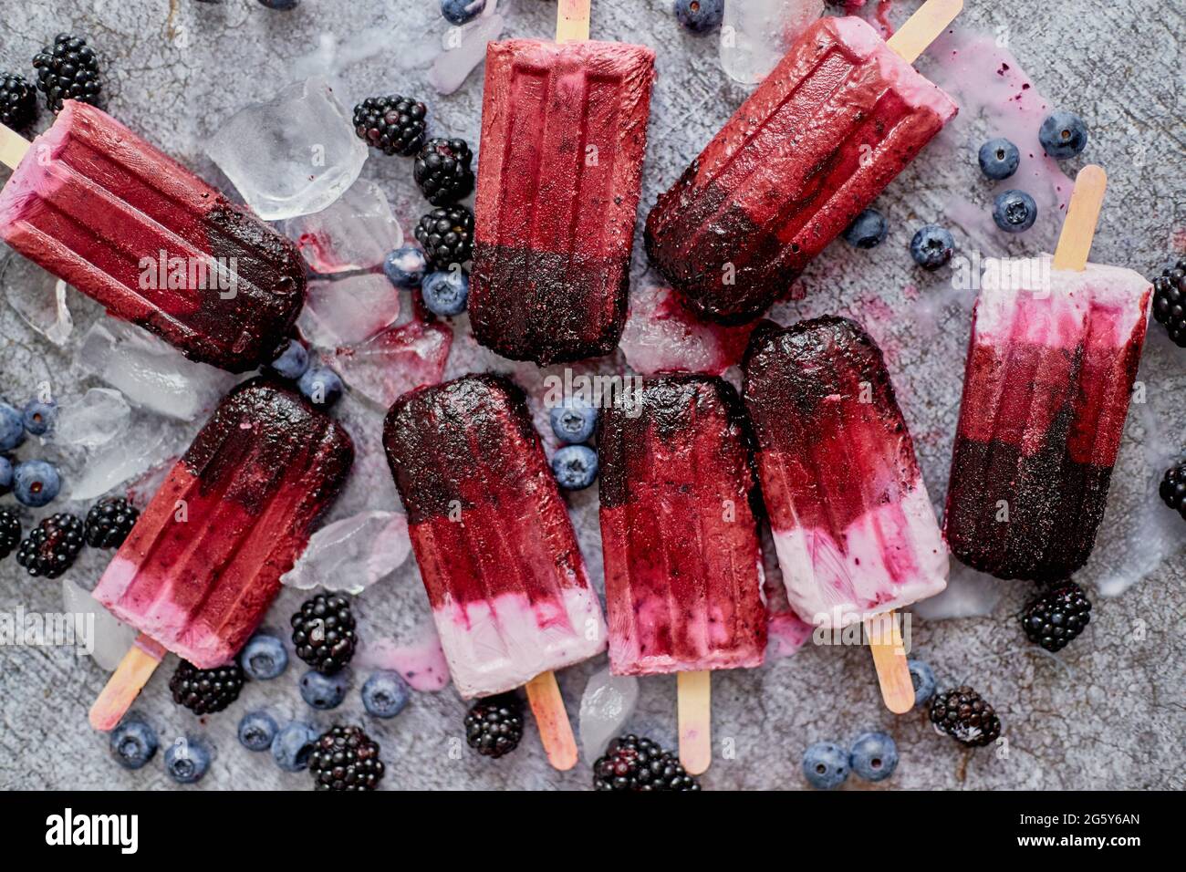 Homemade blackberry and cream ice-creams or popsicles with frozen ...