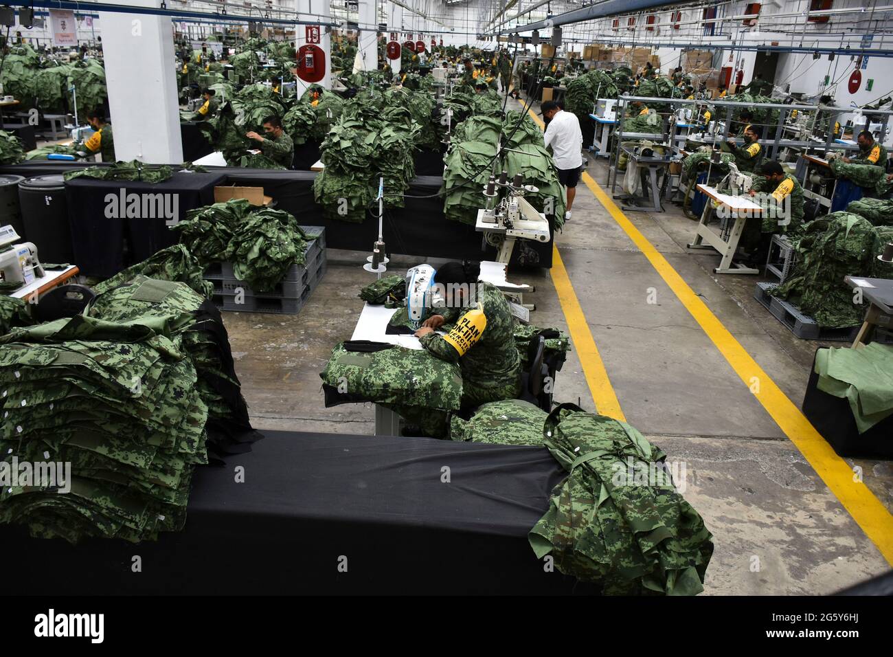 MEXICO CITY, MEXICO - JUNE 15: A military manufactures uniforms for ...