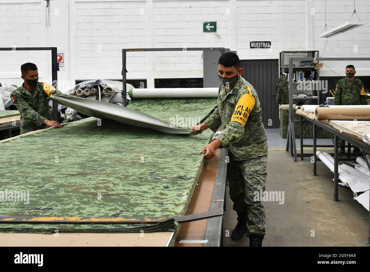 MEXICO CITY, MEXICO - JUNE 15: A military manufactures uniforms for ...