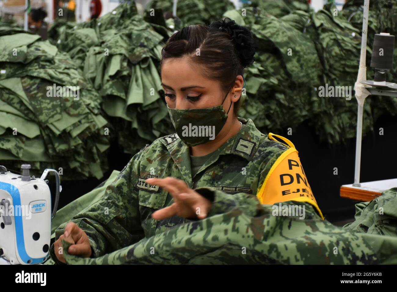 MEXICO CITY, MEXICO - JUNE 15: A military manufactures uniforms for ...