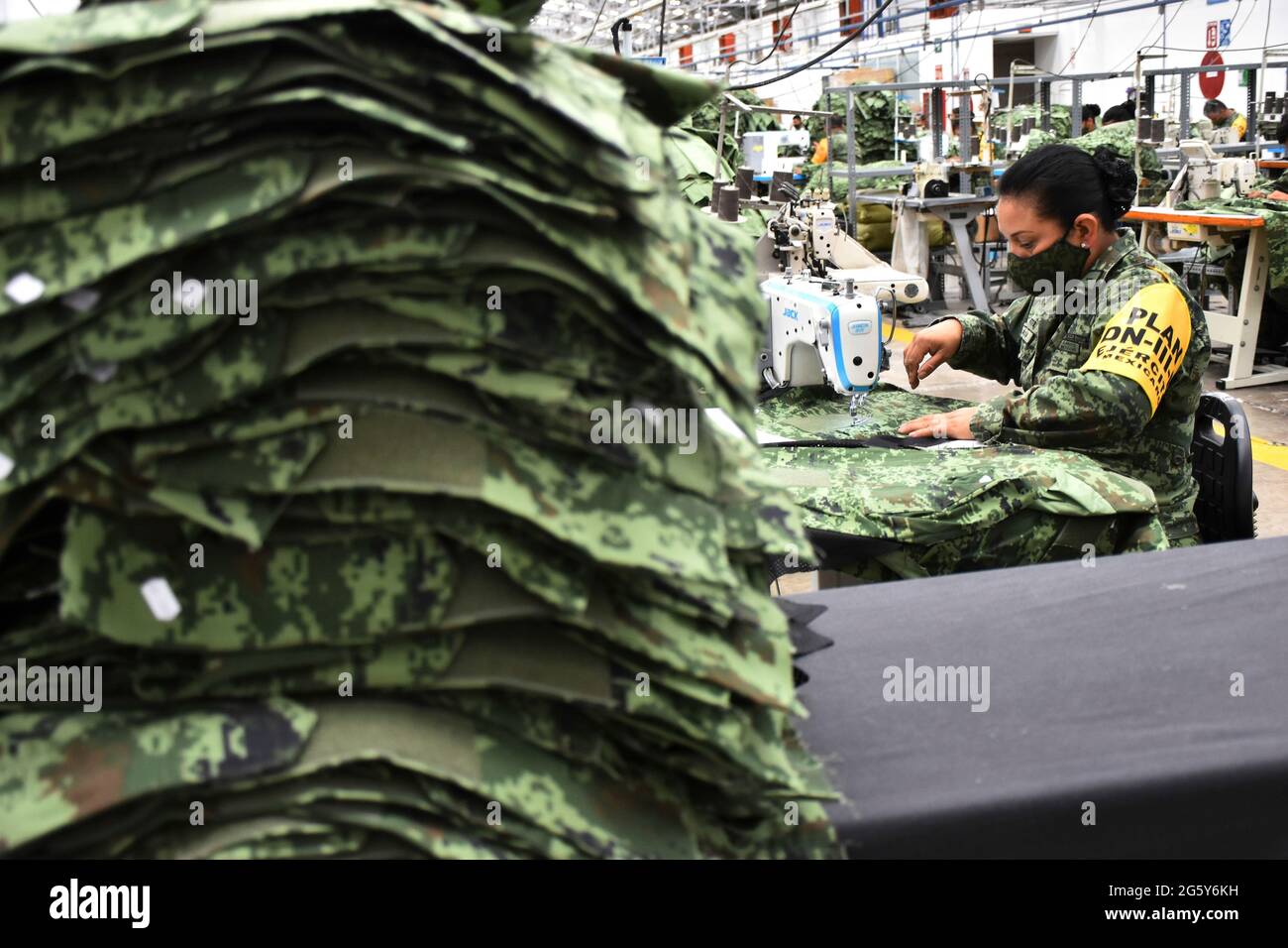 MEXICO CITY, MEXICO - JUNE 15: A military manufactures uniforms for ...