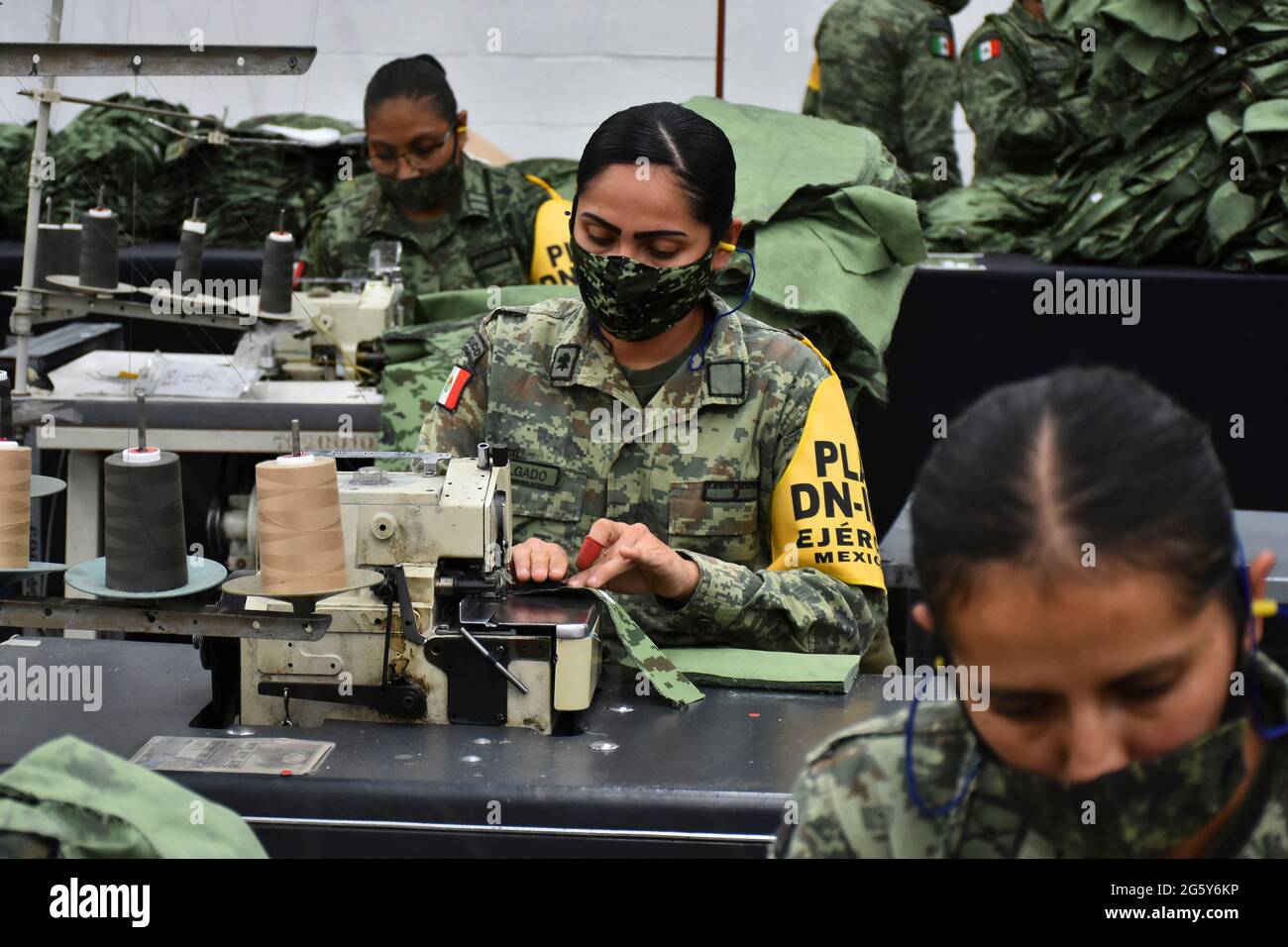 MEXICO CITY, MEXICO - JUNE 15: A military manufactures uniforms for ...