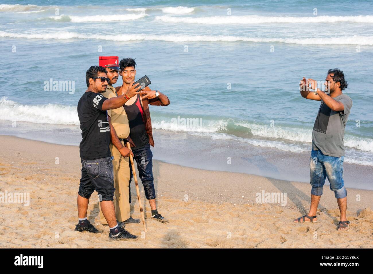 Puducherry police officer wearing French kepi and carrying lathi poses ...