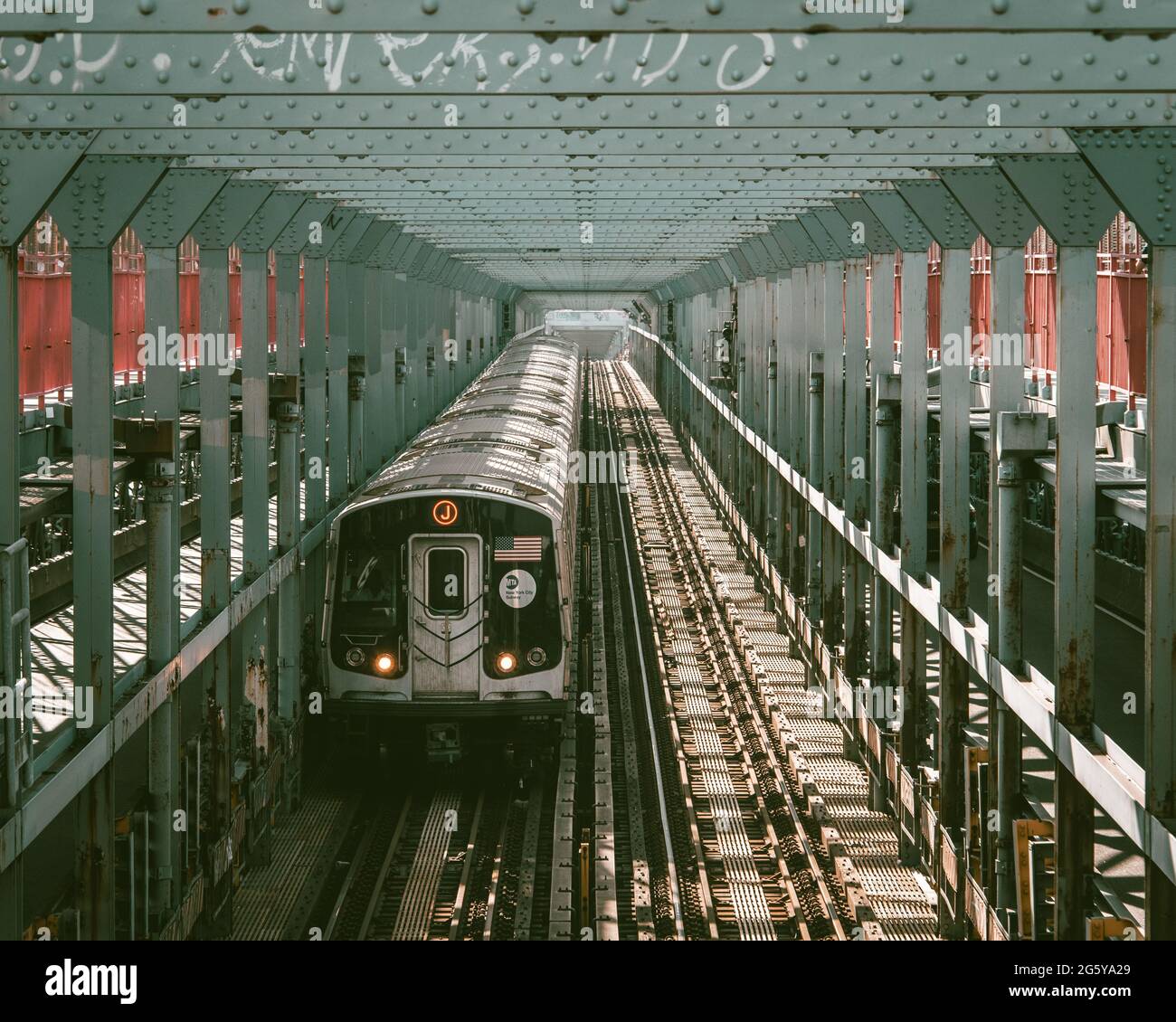 Subway train crossing the Williamsburg Bridge, in New York City Stock Photo - Alamy
