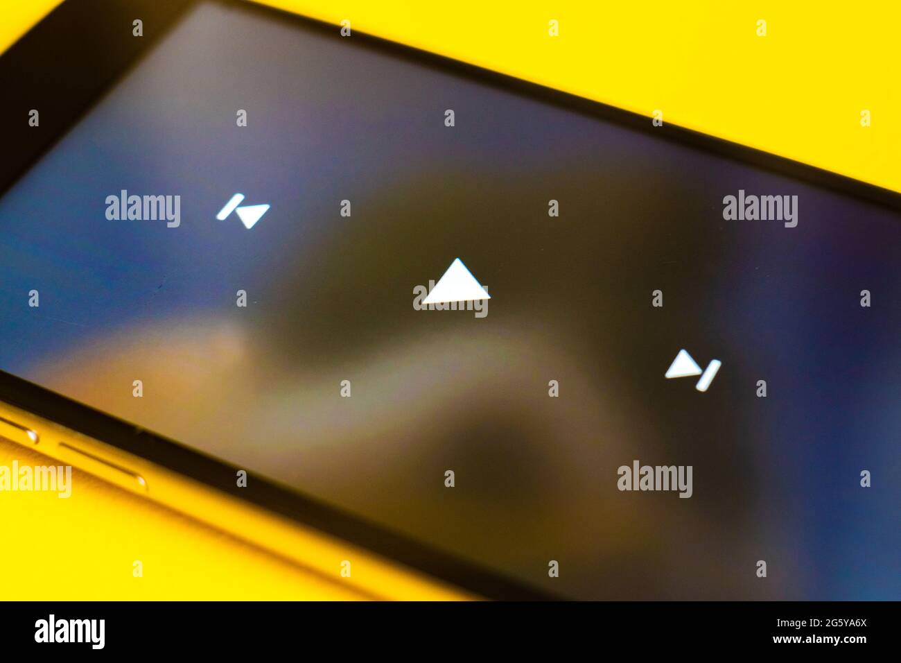 close up play button interface on a modern gadget when watching video ...