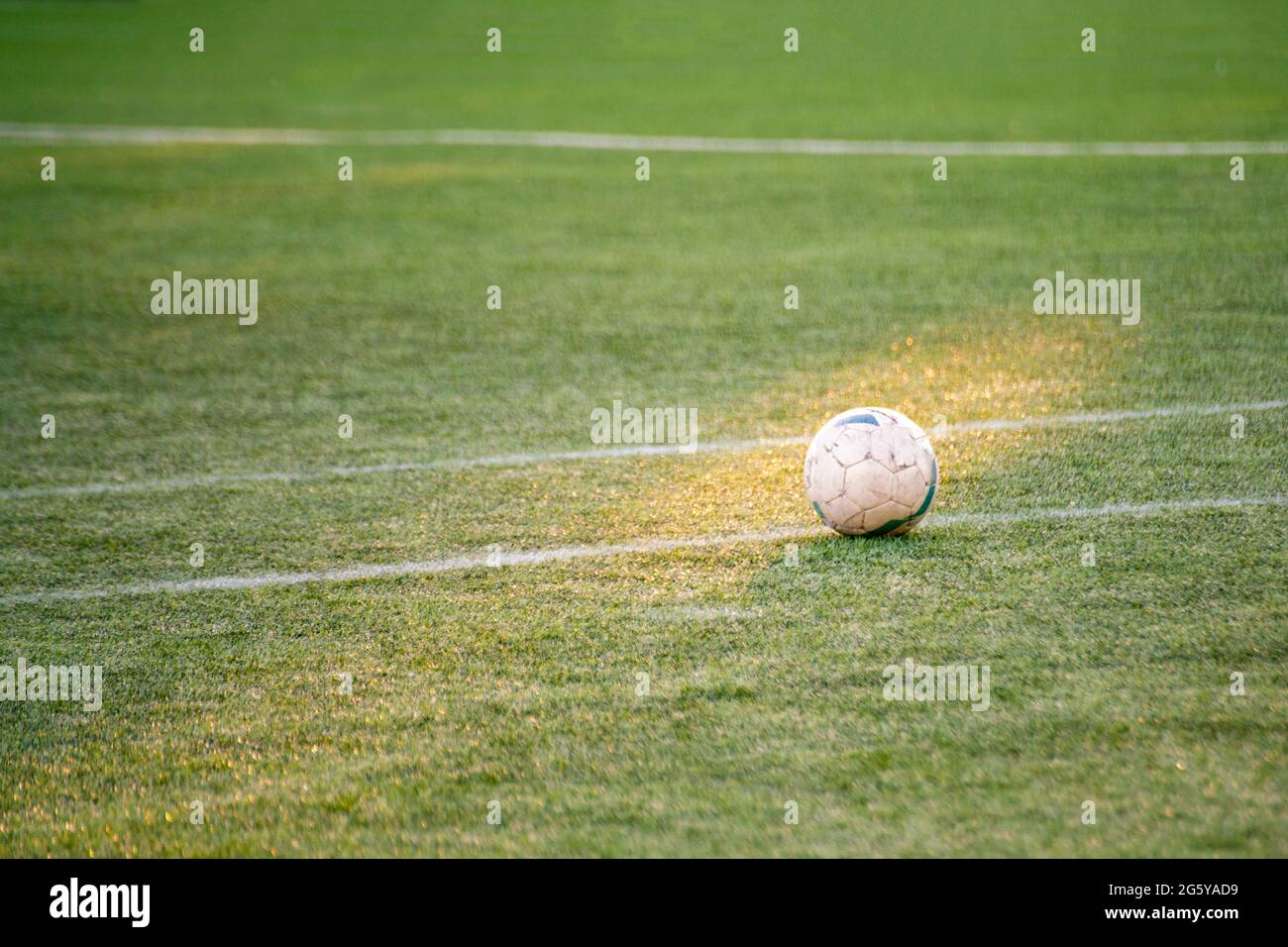 football soccer ball on the field of grass Stock Photo - Alamy