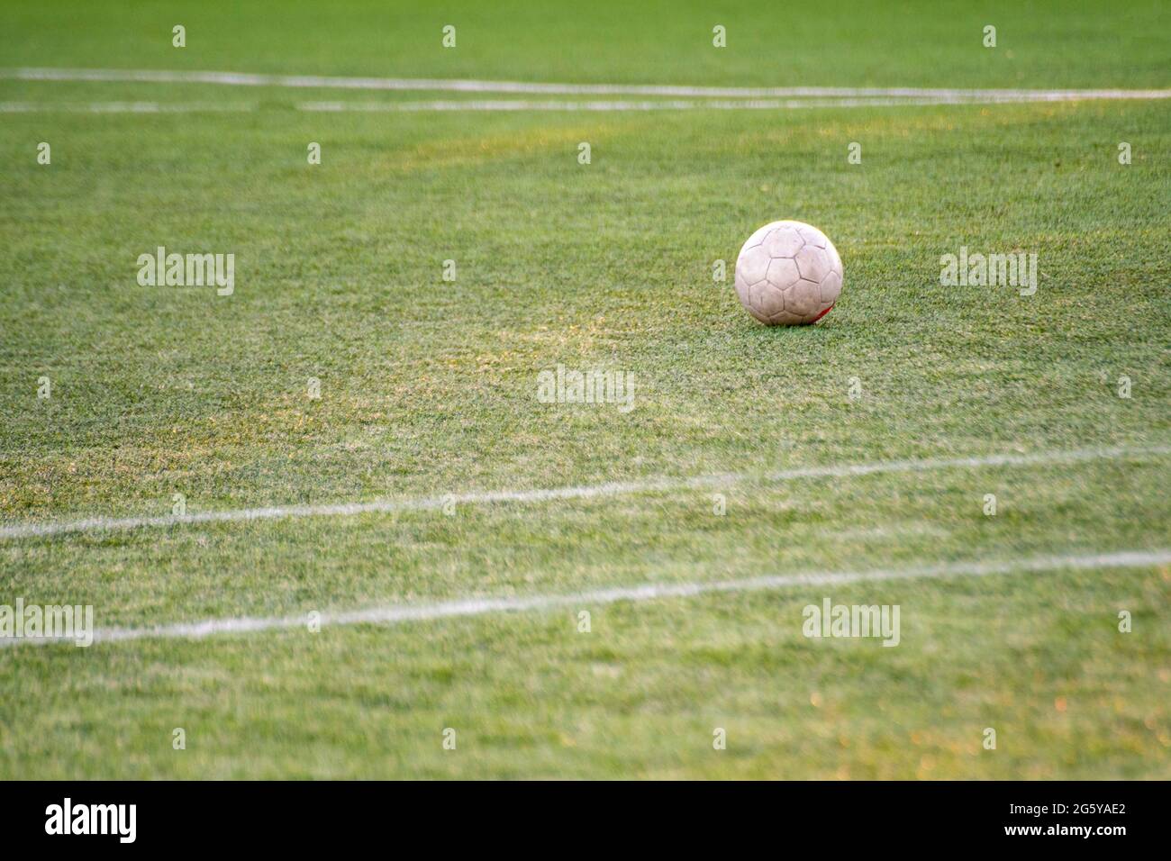 football soccer ball on the field of grass Stock Photo - Alamy