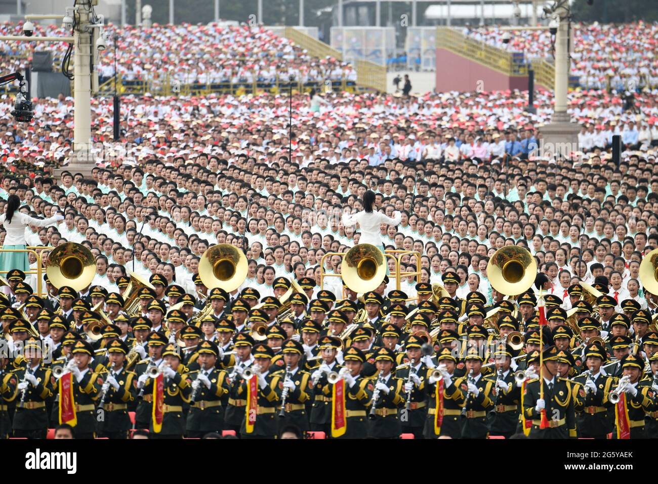 Beijing, China. 1st July, 2021. Chorus members perform ahead of a grand ...